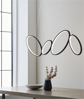 Suspended Linear Lights, Larger Fixtures Hanging from Thin Wire ...