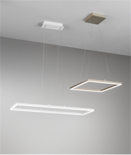Suspended lights, larger fixtures hanging from thin wire | Lighting Styles