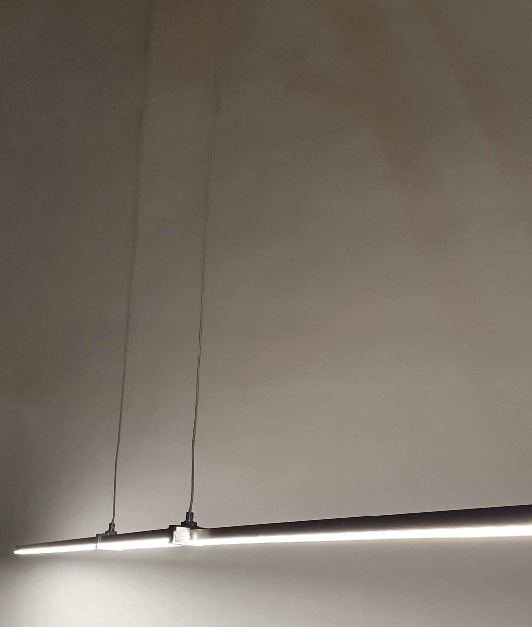 The Profile Extends on this Extra Slim Suspended LED Pendant Light