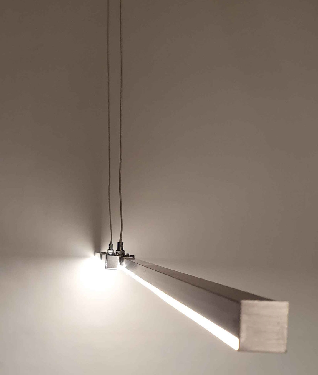 The Profile Extends on this Extra Slim Suspended LED Pendant Light
